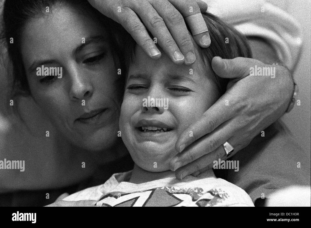 Family crying Black and White Stock Photos & Images - Alamy
