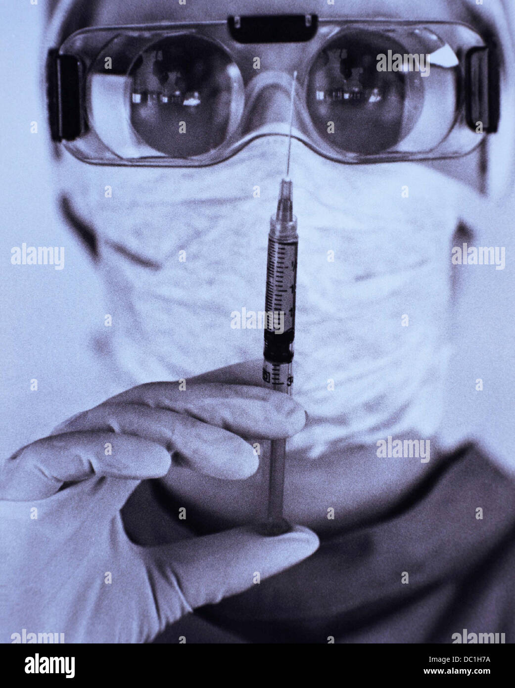 Scary doc with needle Stock Photo - Alamy