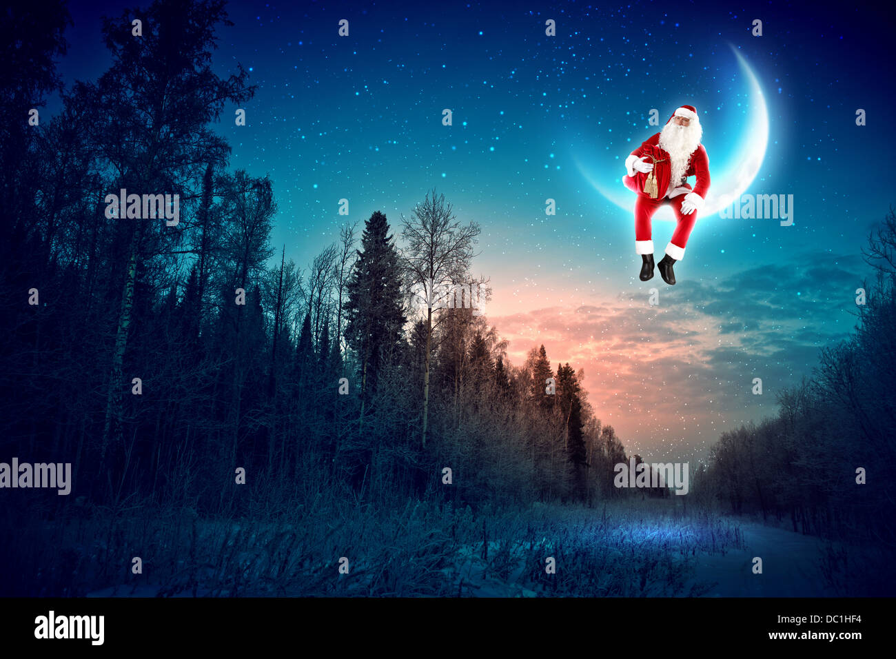 photo of santa claus sitting on the moon Stock Photo - Alamy