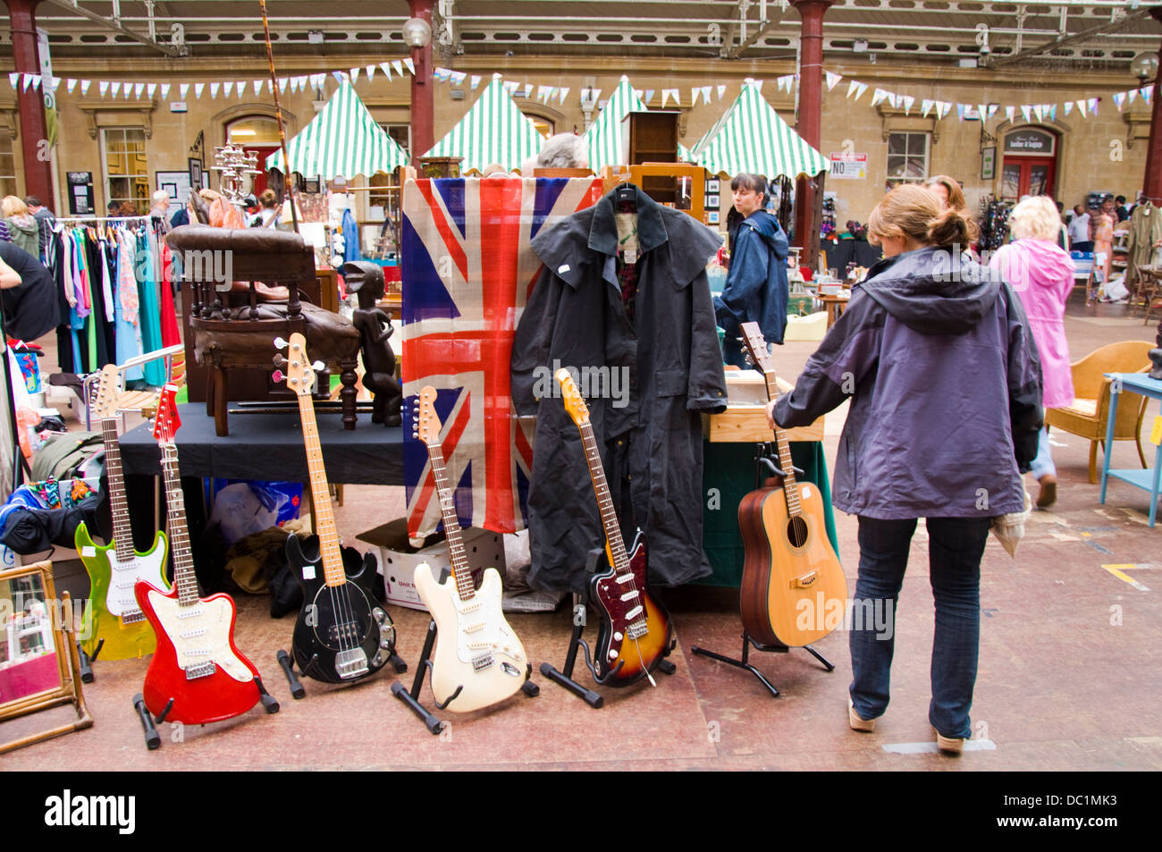 Green Park market a stall selling guitars in the old Green Park railway ...
