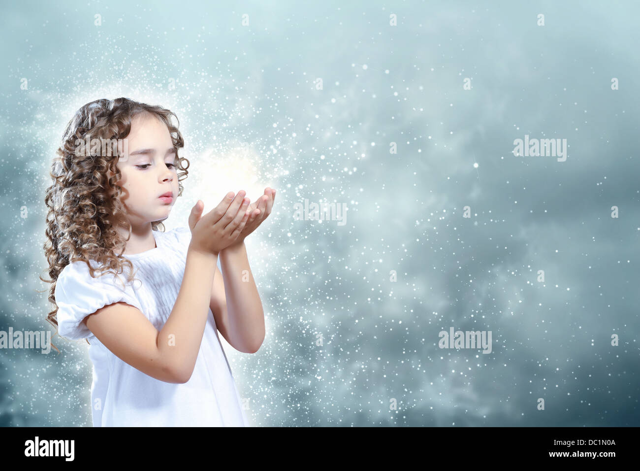 Child with magic light Stock Photo - Alamy