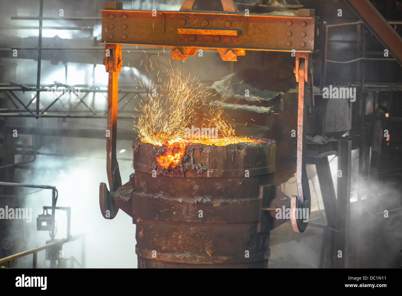 Steel bucket molten metal in hi-res stock photography and images - Alamy