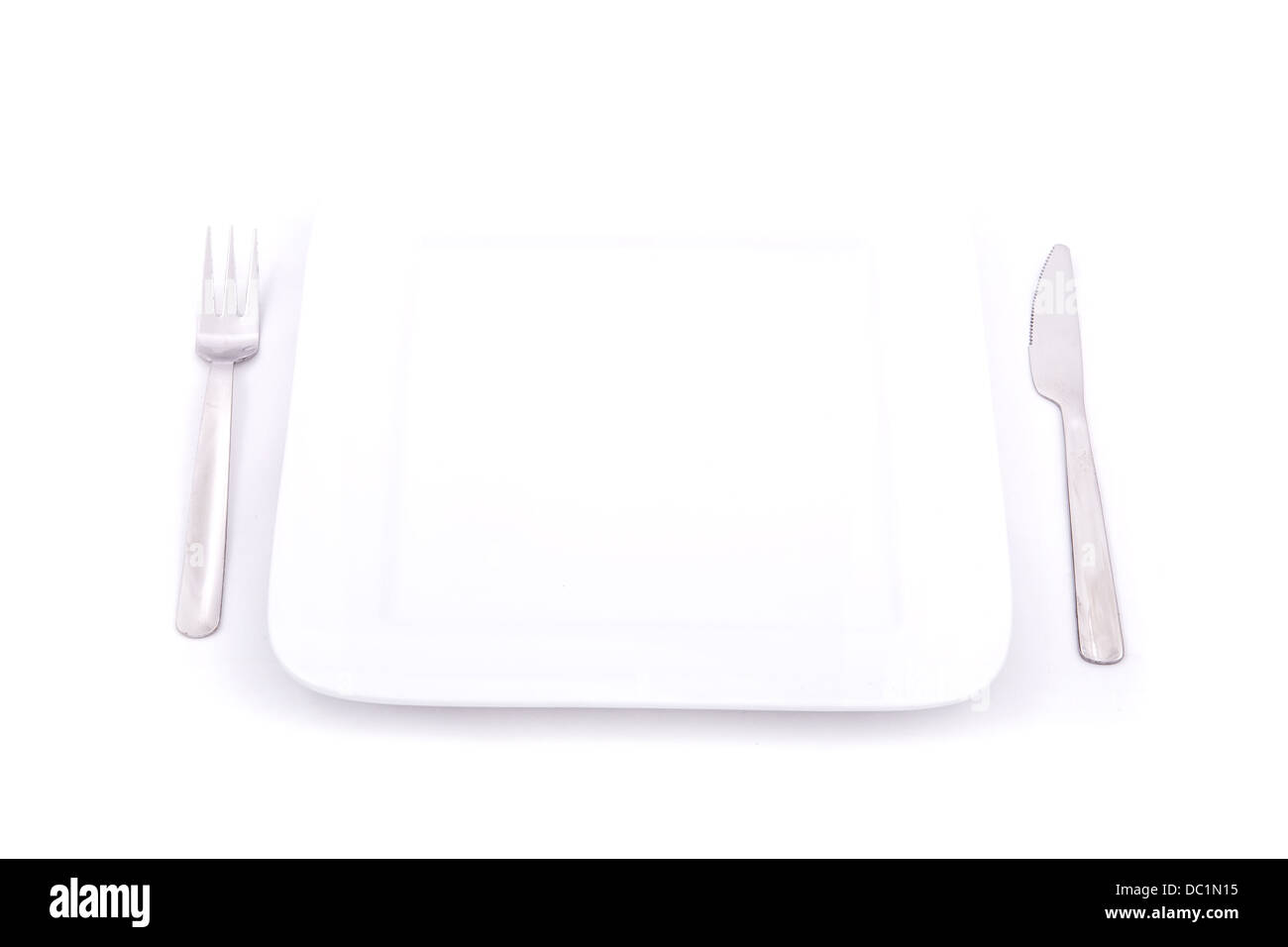 A blank plate isolated on white Stock Photo - Alamy