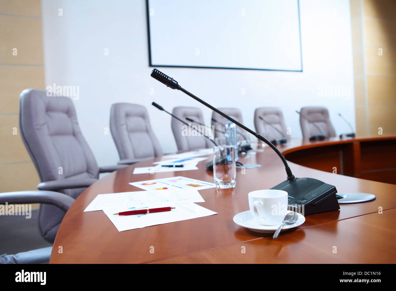 Conference hall with microphones Stock Photo - Alamy