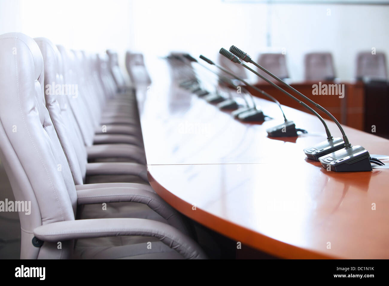 Conference hall with microphones Stock Photo - Alamy