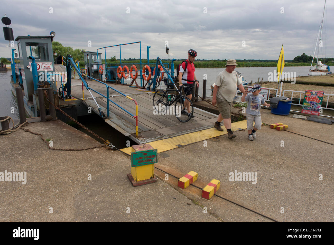 Foot passengers disembarking the small chain ferry crossing the River ...