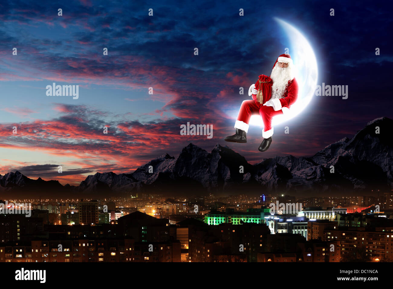 photo of santa claus sitting on the moon Stock Photo - Alamy