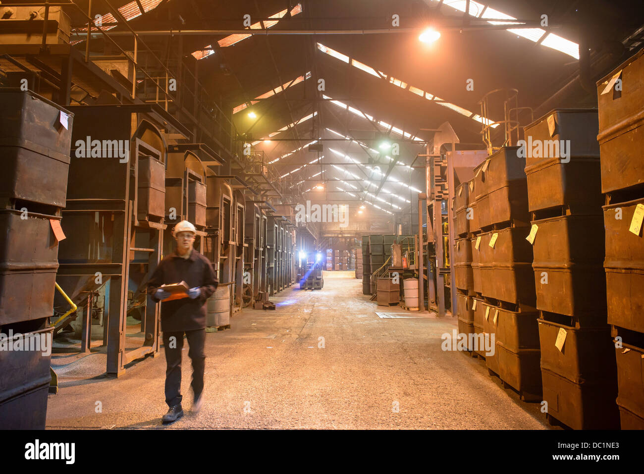 Business Man Walking Into Factory Stock Photos & Business Man Walking ...