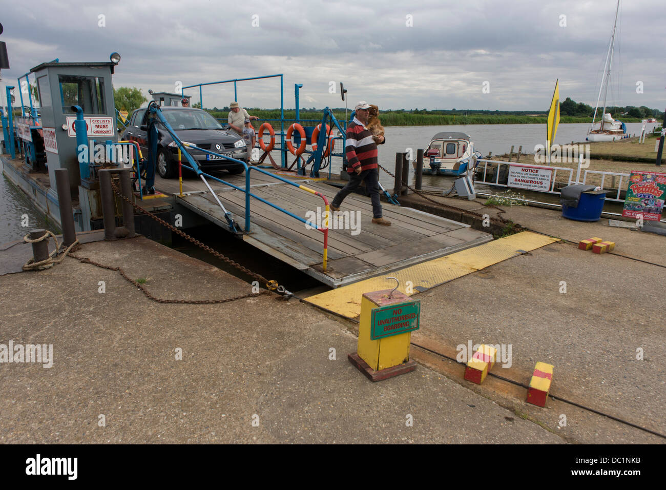 Foot passengers disembarking the small chain ferry crossing the River ...