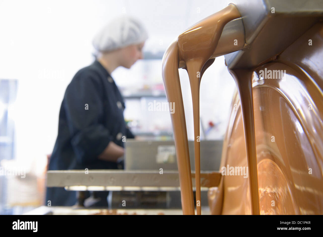 Liquid chocolate factory hi-res stock photography and images - Alamy