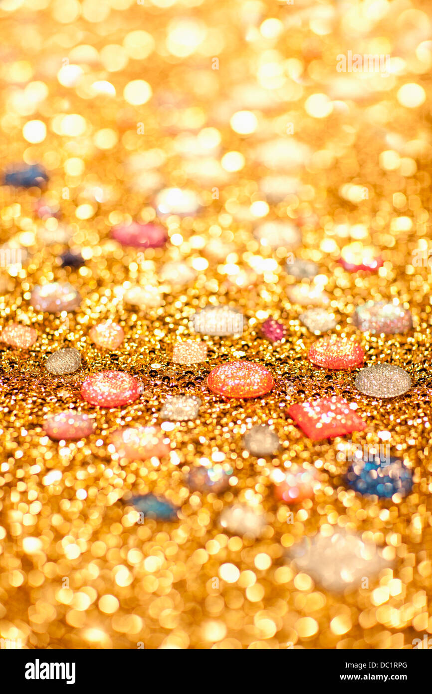 jewels on golden background Stock Photo - Alamy