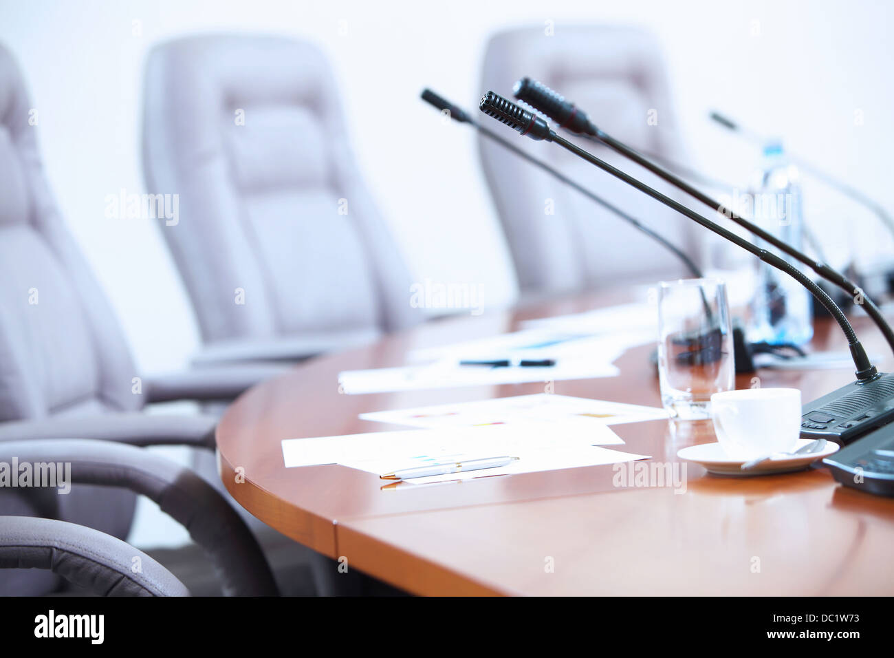 Conference hall with microphones Stock Photo - Alamy