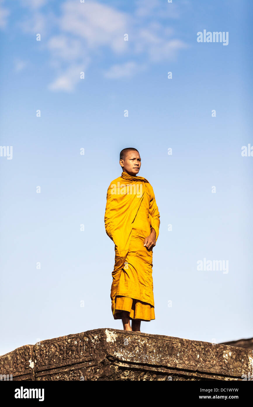 Young Buddhist Monk Standing Outside High Resolution Stock Photography ...