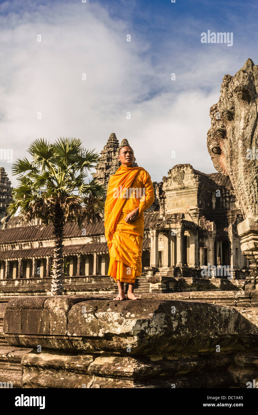 Young Buddhist Monk Standing Outside High Resolution Stock Photography ...