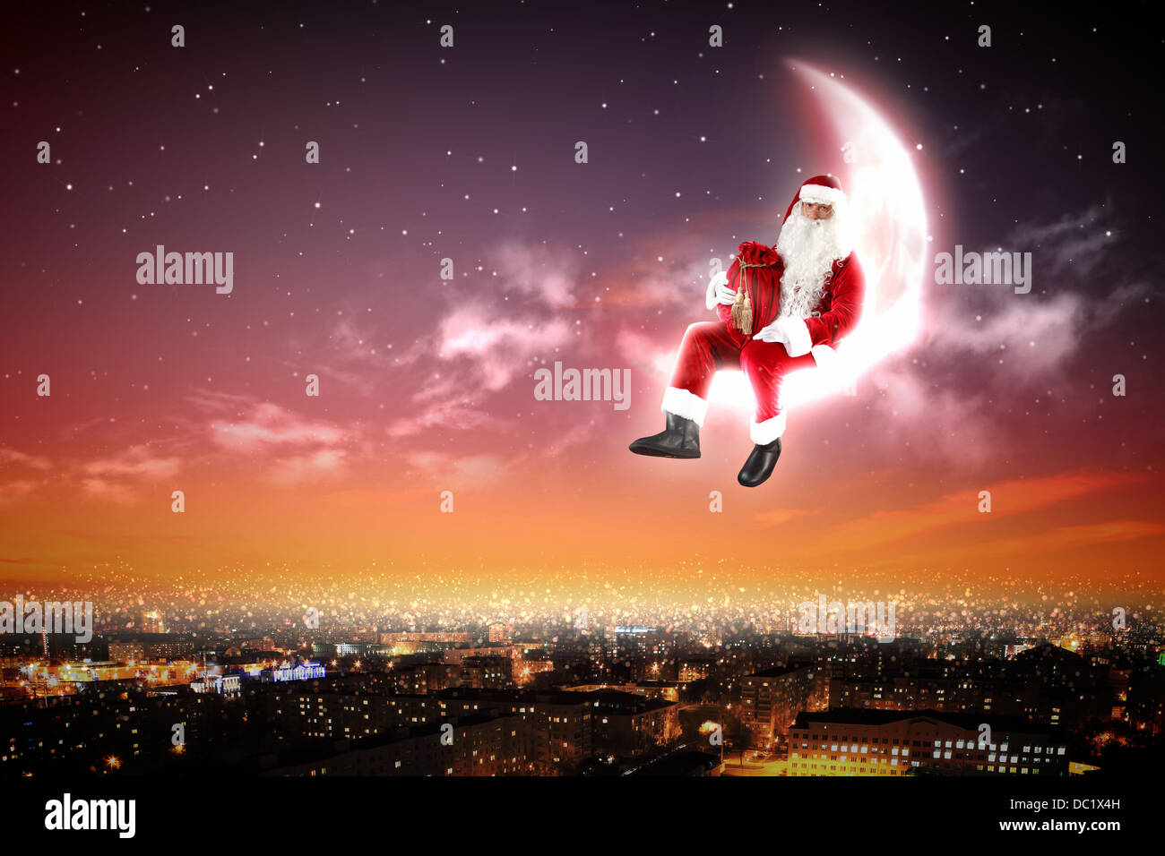 Santa on the moon Stock Photo - Alamy