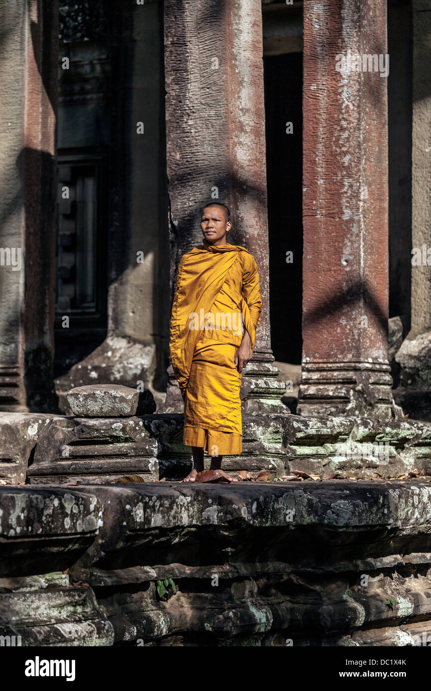 Young Buddhist Monk Standing Outside High Resolution Stock Photography ...