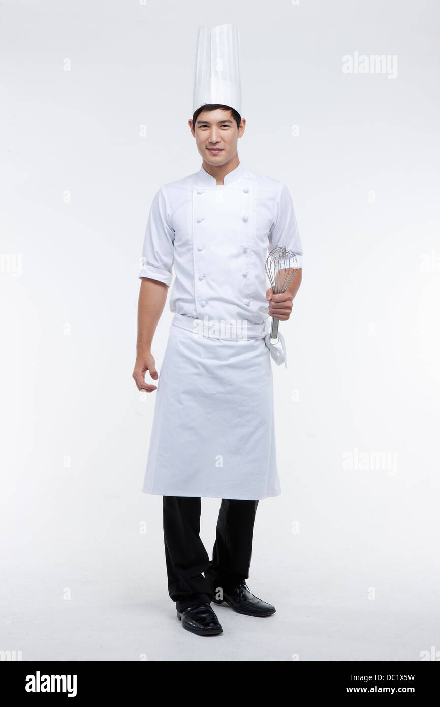 a male cook posing with cooking tool Stock Photo - Alamy
