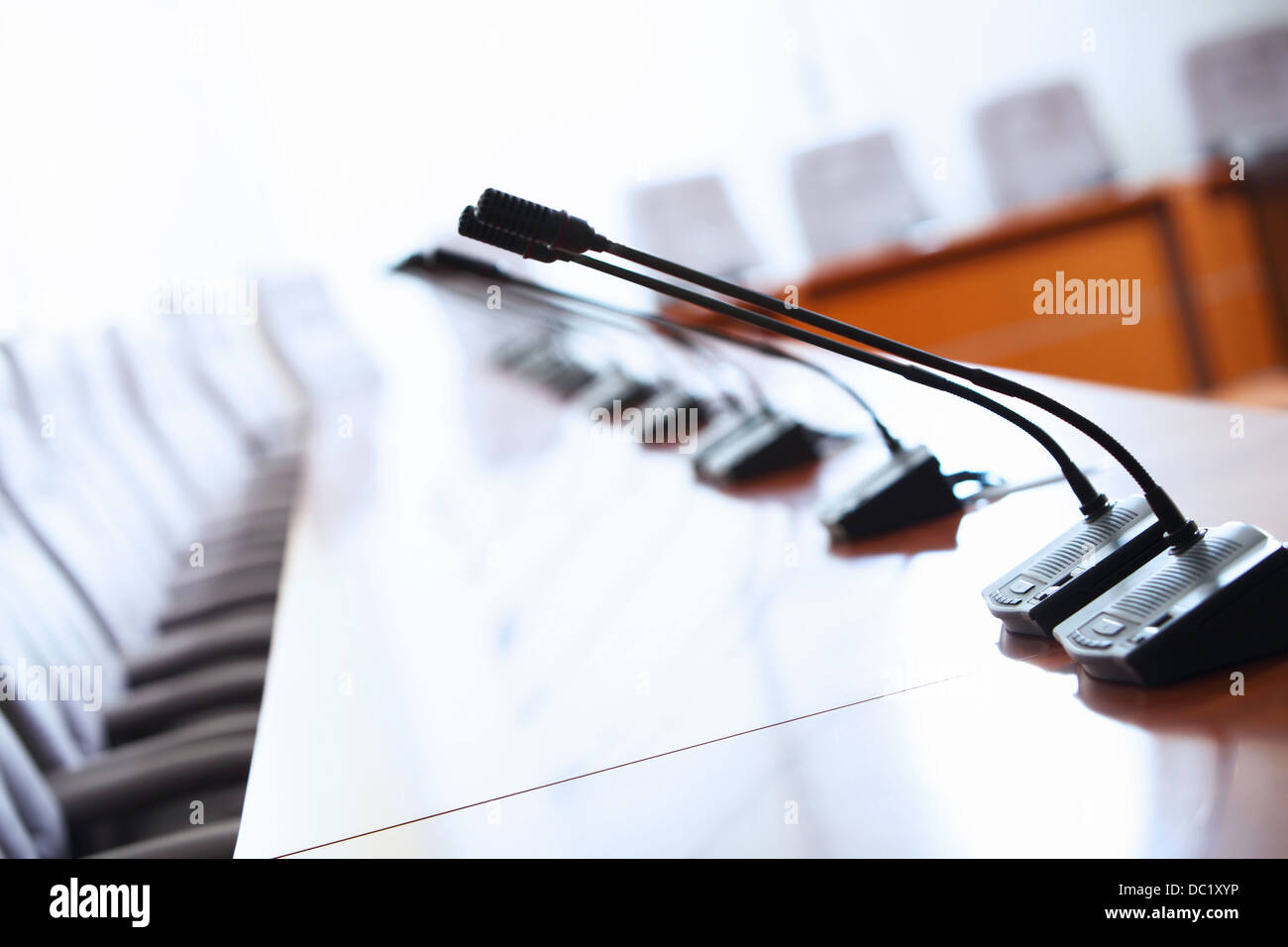 Conference hall with microphones Stock Photo - Alamy