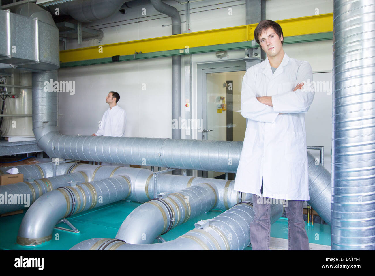 Portrait of two scientists in technical laboratory Stock Photo - Alamy