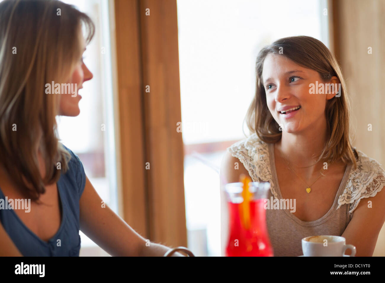 Woman chatting in restaurant hi-res stock photography and images - Alamy