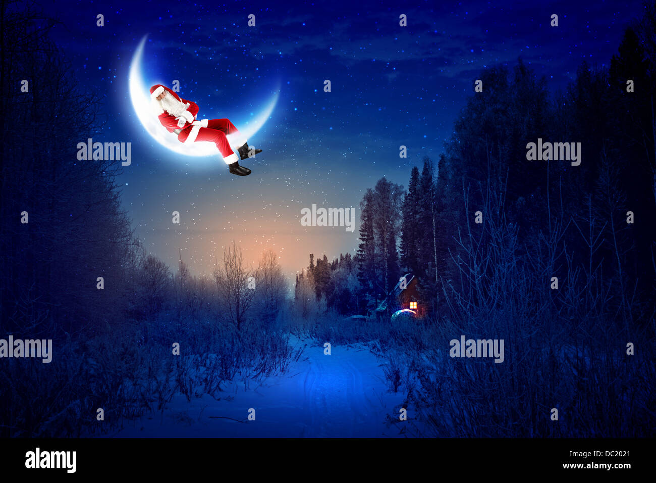 photo of santa claus sitting on the moon Stock Photo - Alamy