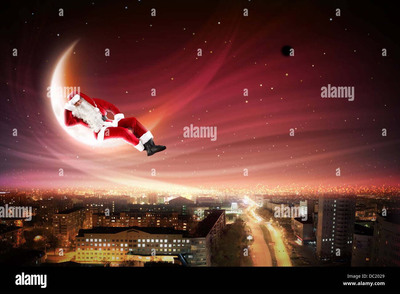 Santa on the moon Stock Photo - Alamy