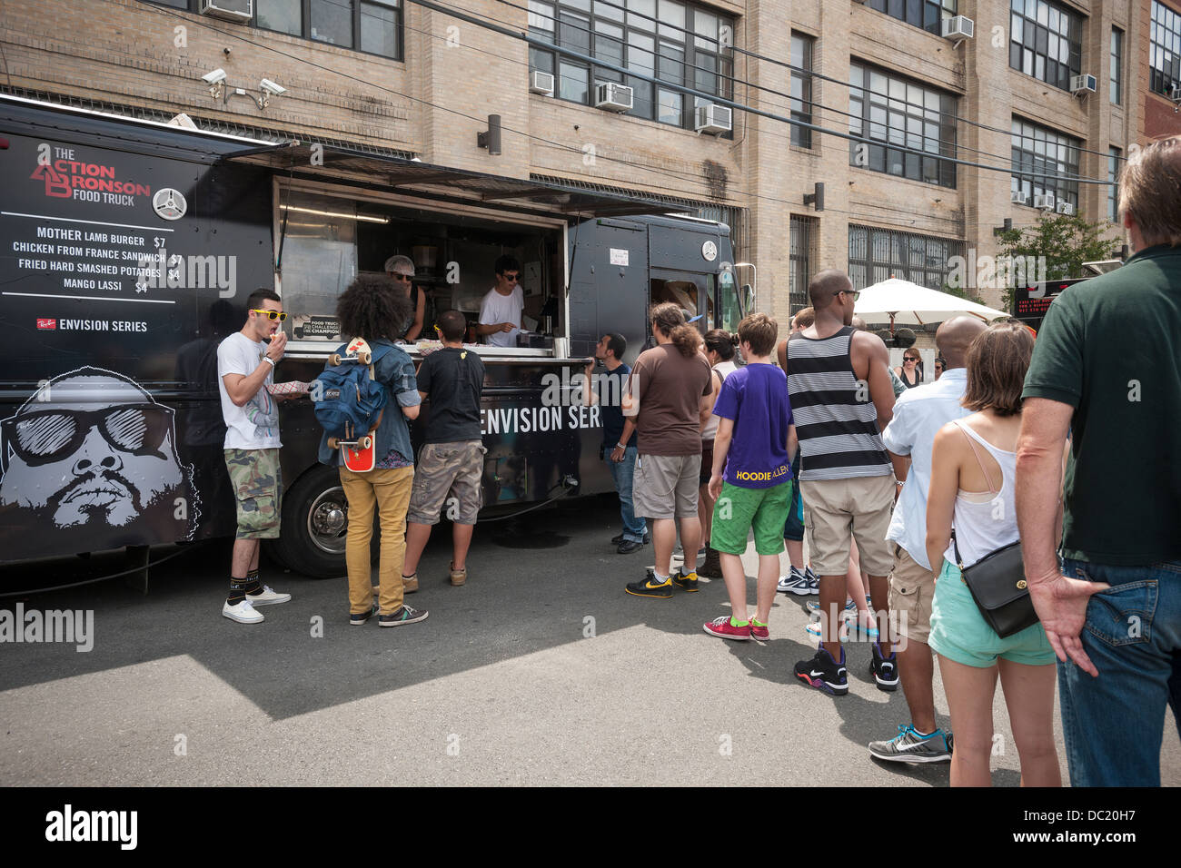 Hipsters drink beer and and buy food from food trucks at the annual ...