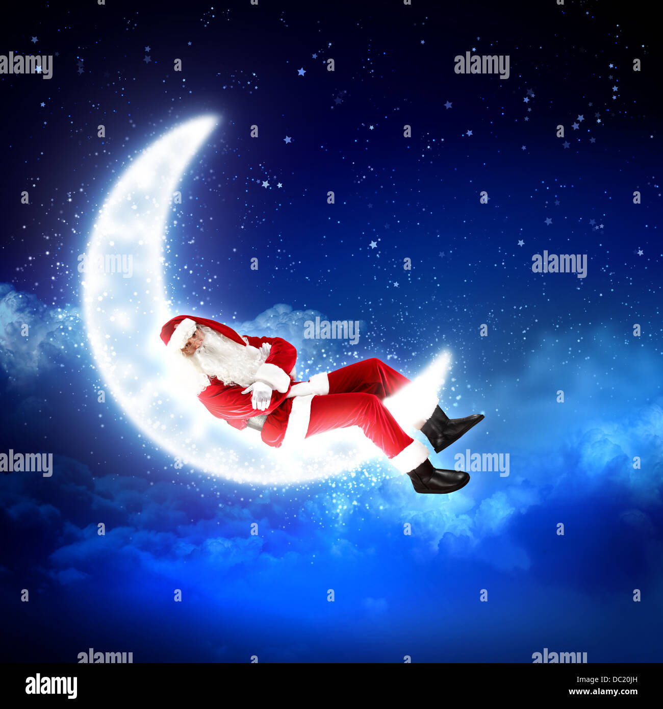 photo of santa claus sitting on the moon Stock Photo - Alamy