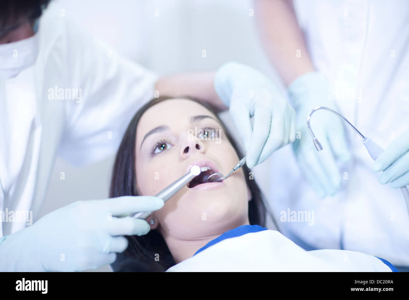 Dentist examining patients teeth Stock Photo - Alamy