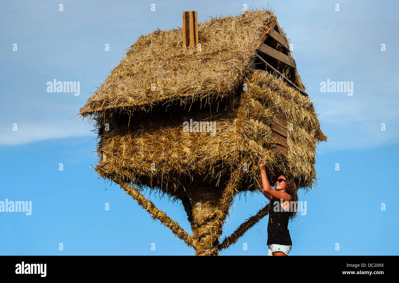 Bohemian Paradise, Karlovice. 6th Aug, 2013. One of the straw statues is seen within the Straw ...