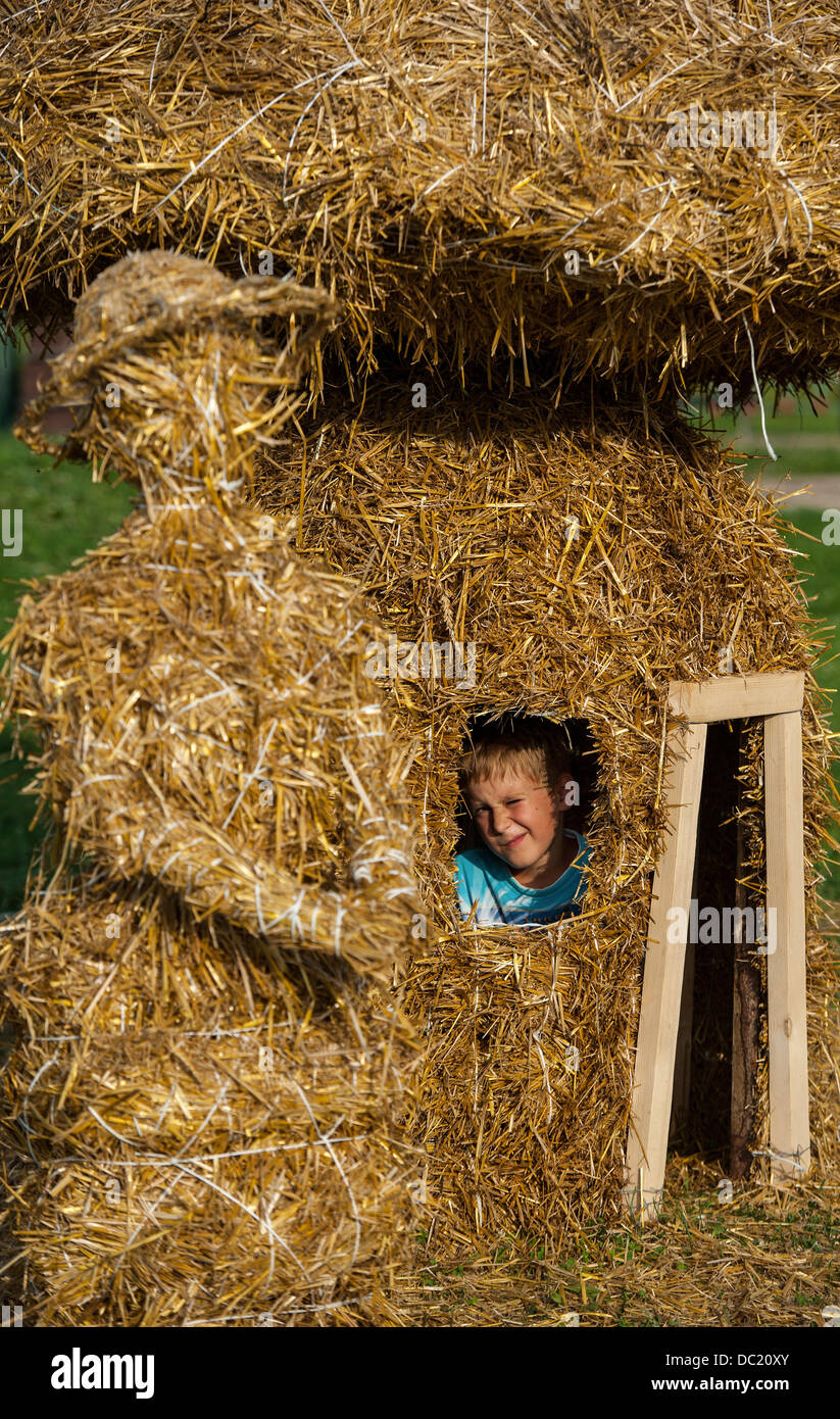 Bohemian Paradise, Karlovice. 6th Aug, 2013. One of the straw statues is seen within the Straw ...