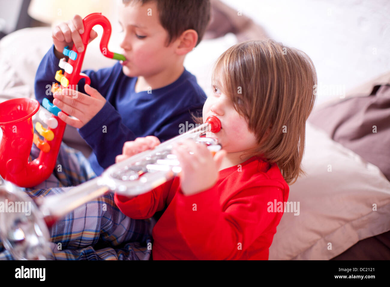 Children playing instruments hi-res stock photography and images - Alamy