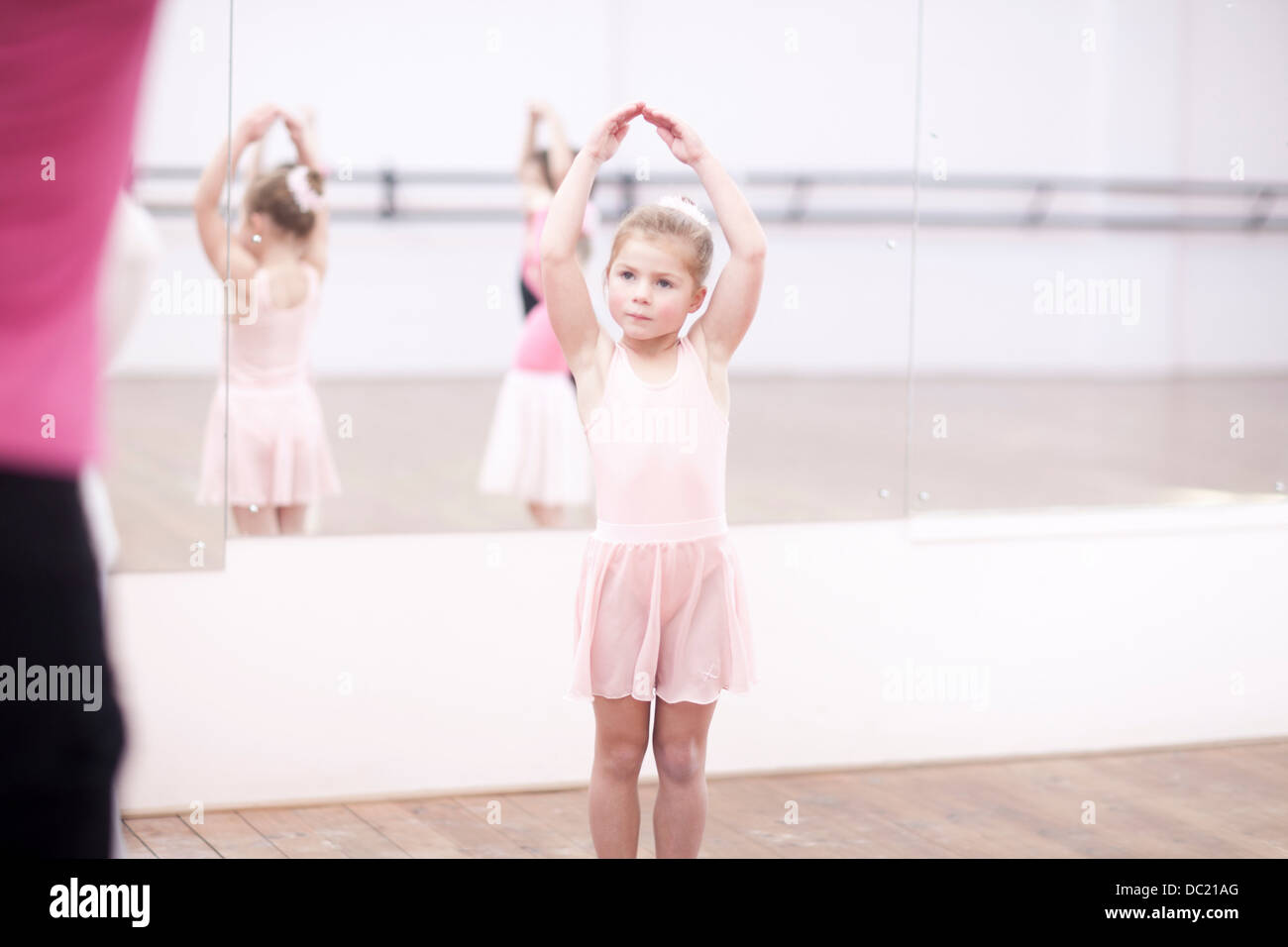 Young ballerinas posing in dance studio Stock Photo - Alamy