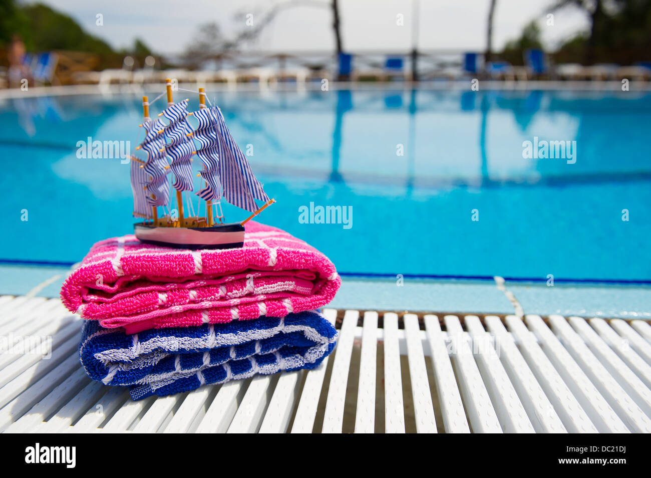 Little sailboat to play with at swimming pool Stock Photo - Alamy