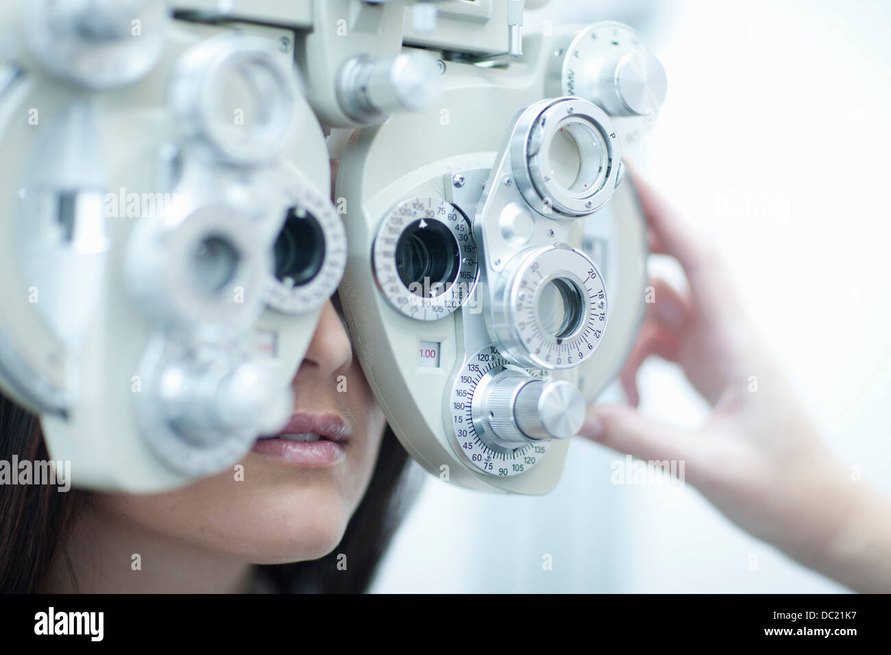 Young woman having eye test Stock Photo - Alamy