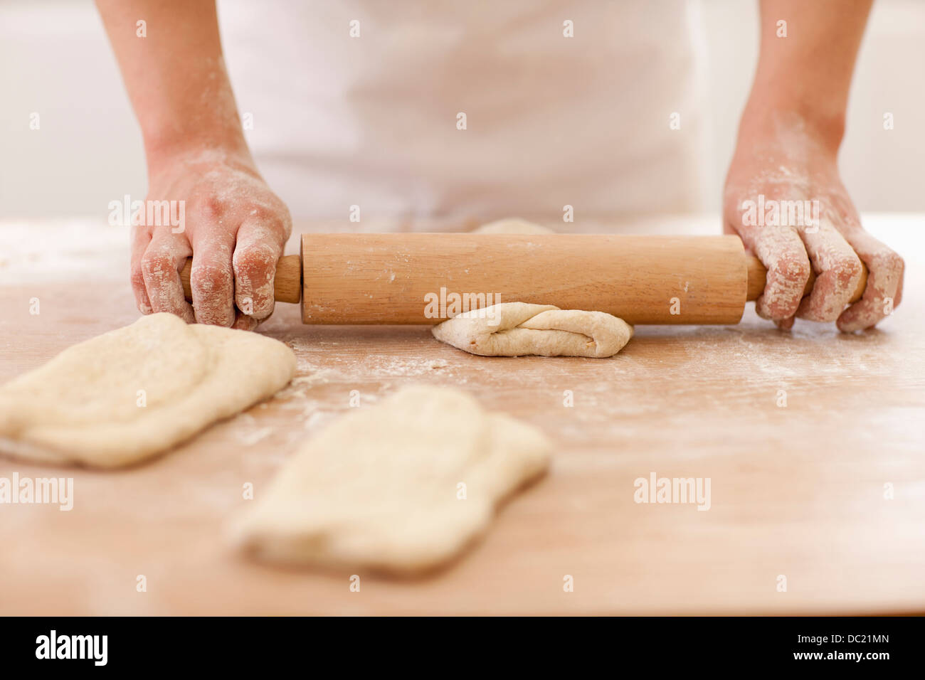 making a shape of a bread dough Stock Photo - Alamy