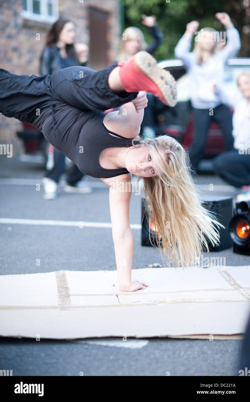 Girl breakdancing in carpark Stock Photo - Alamy