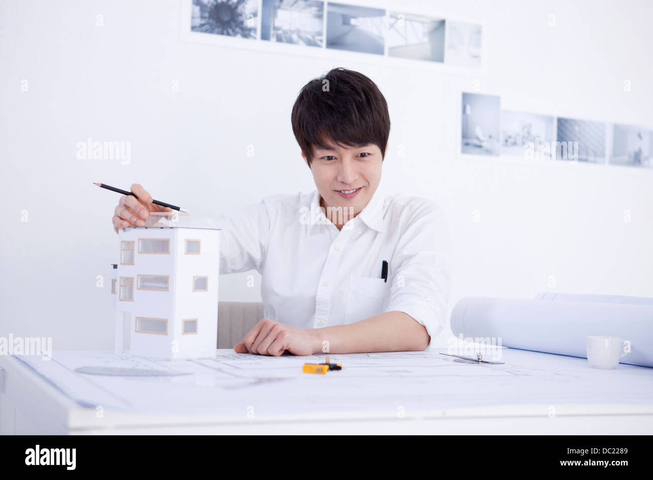 interior designer working at a desk Stock Photo - Alamy