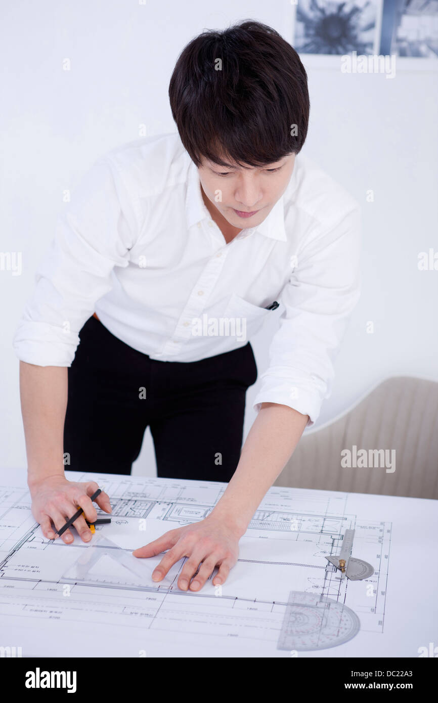 interior designer drawing a draft Stock Photo - Alamy