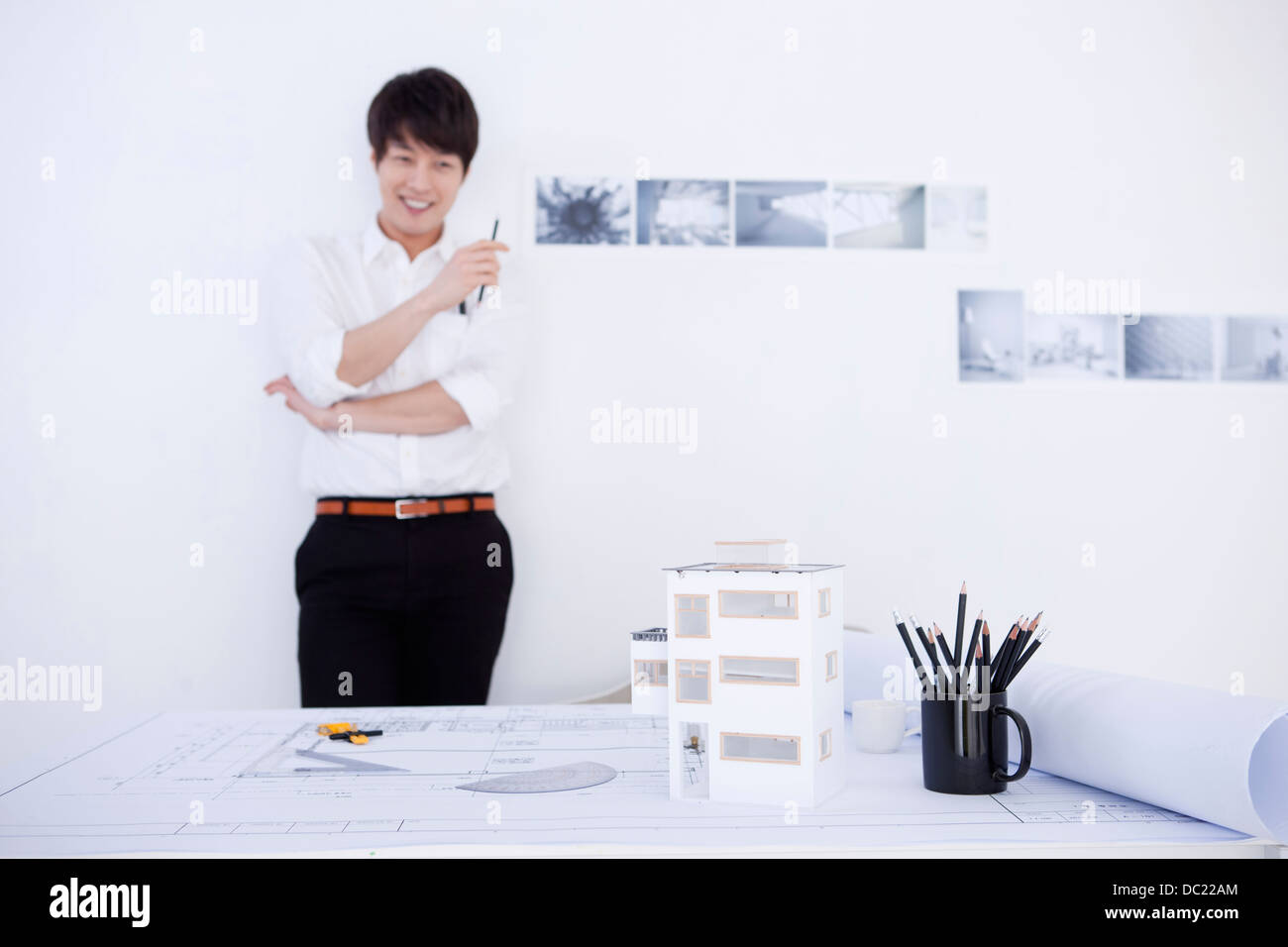 interior designer standing at office Stock Photo - Alamy