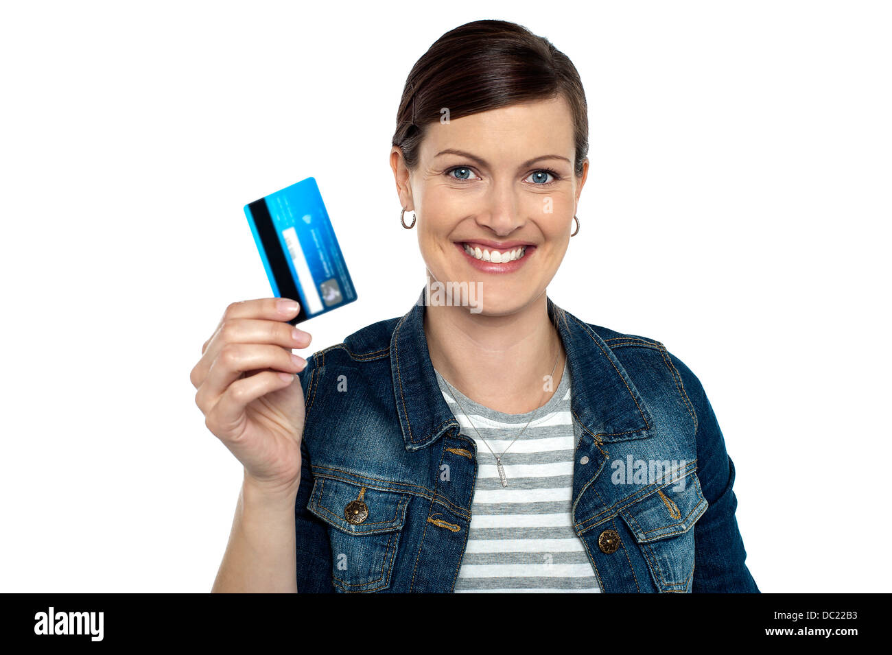 Shopaholic woman showing cash card Stock Photo - Alamy