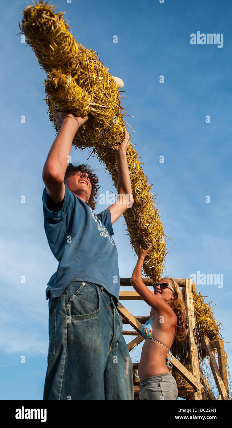 Bohemian Paradise, Karlovice. 6th Aug, 2013. One of the straw statues is seen within the Straw ...