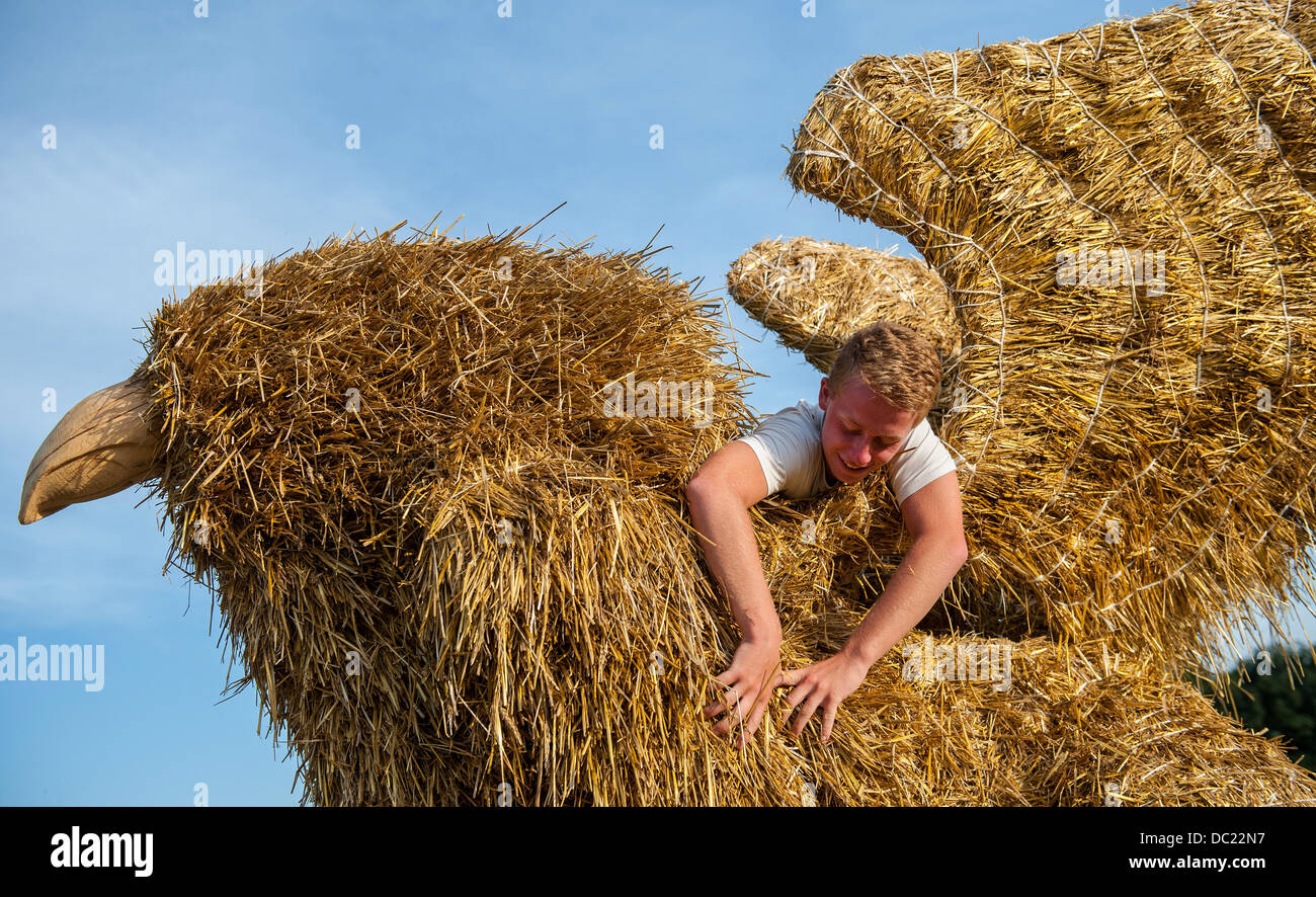 Bohemian Paradise, Karlovice. 6th Aug, 2013. One of the straw statues is seen within the Straw ...