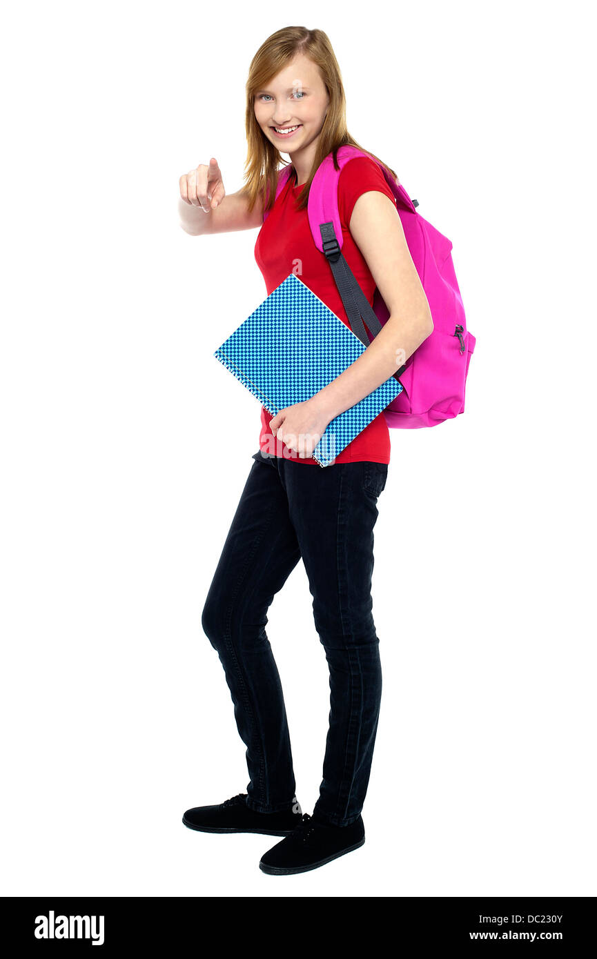 Happy girl pointing finger Cut Out Stock Images & Pictures - Alamy