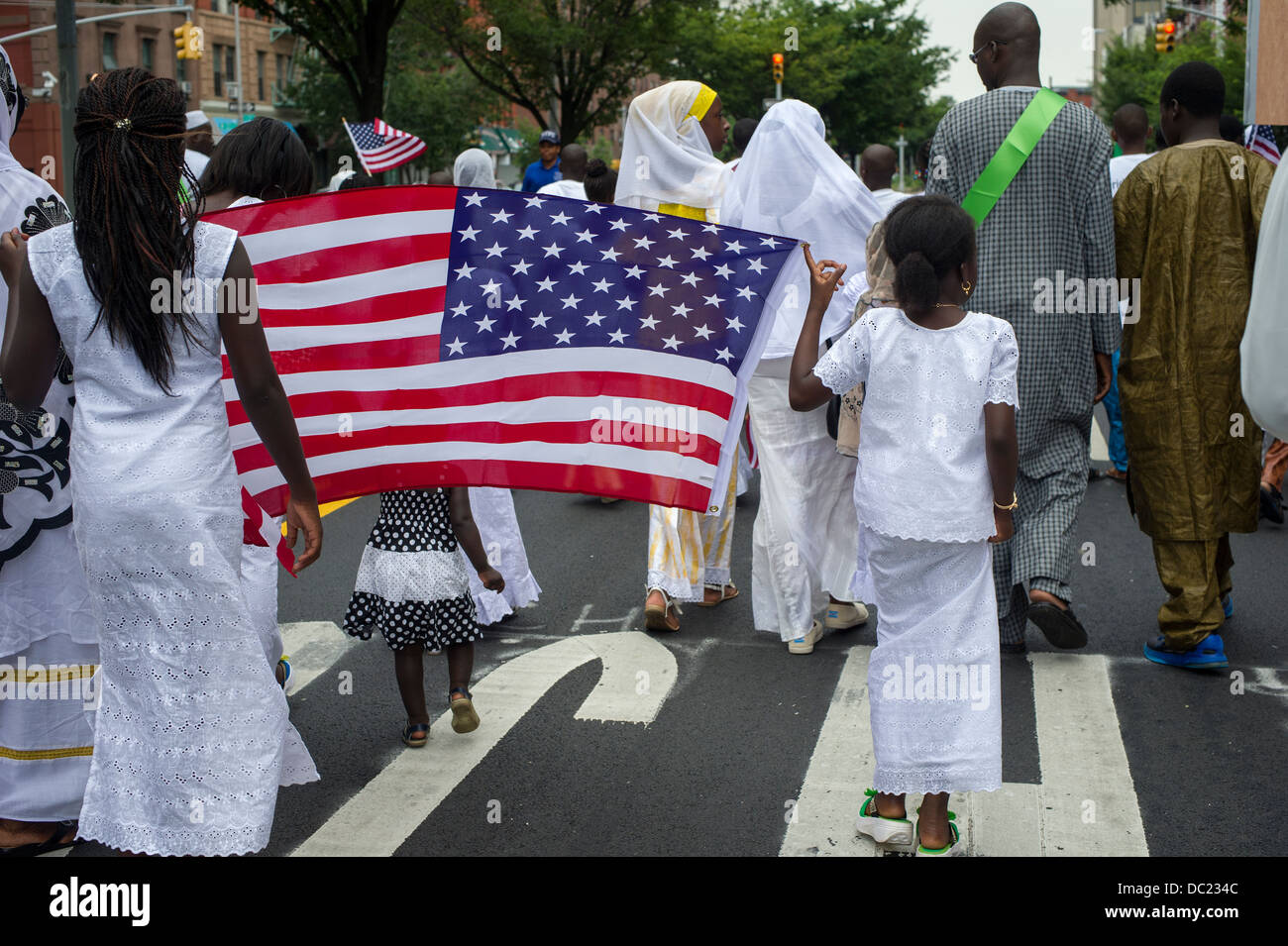 Senegalese immigrants participate in a parade in Harlem in New York ...