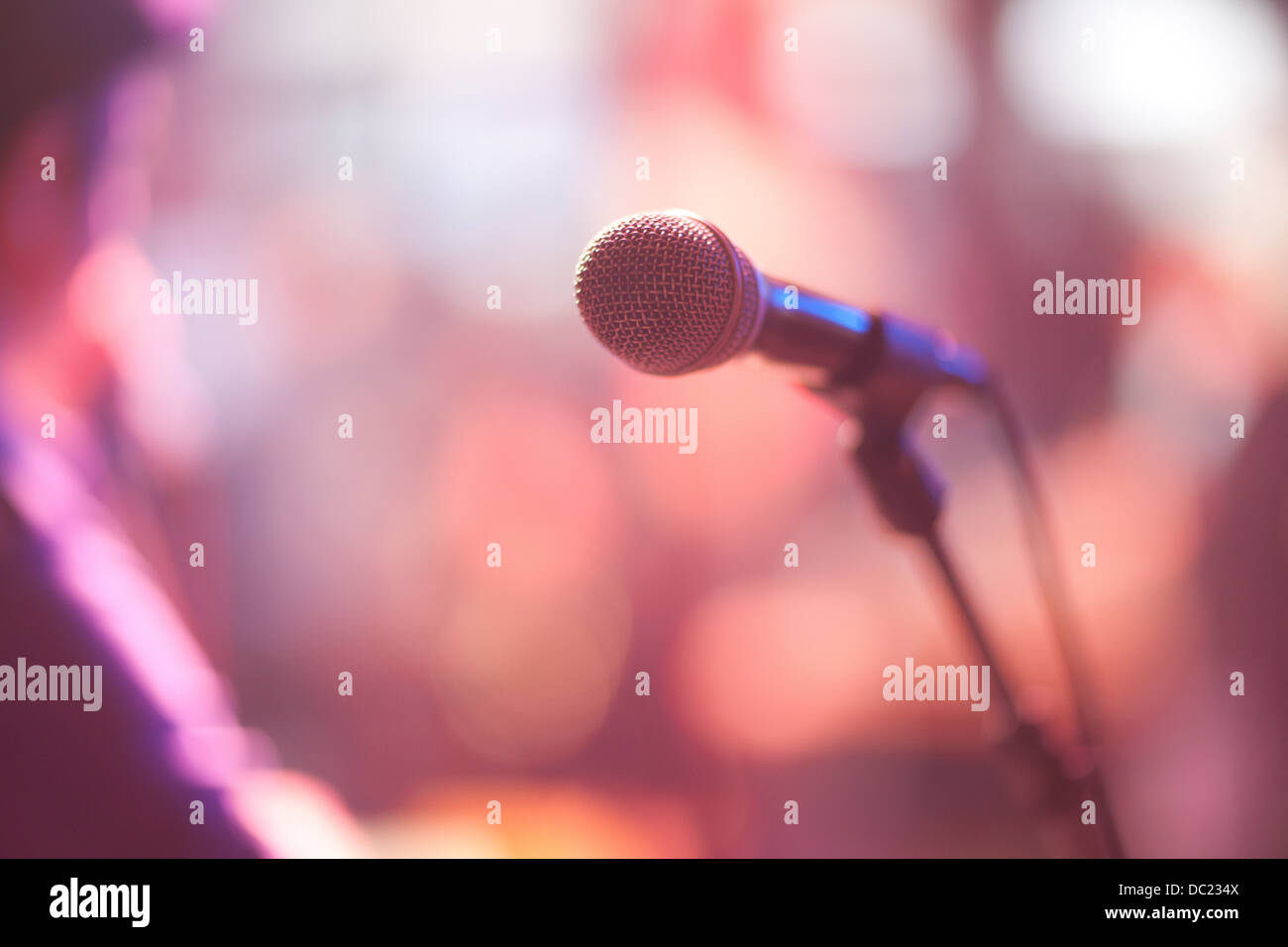 Young male microphone stage hi-res stock photography and images - Alamy