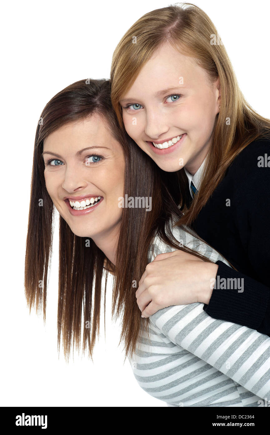 Pretty daughter enjoying a piggyback ride Stock Photo - Alamy