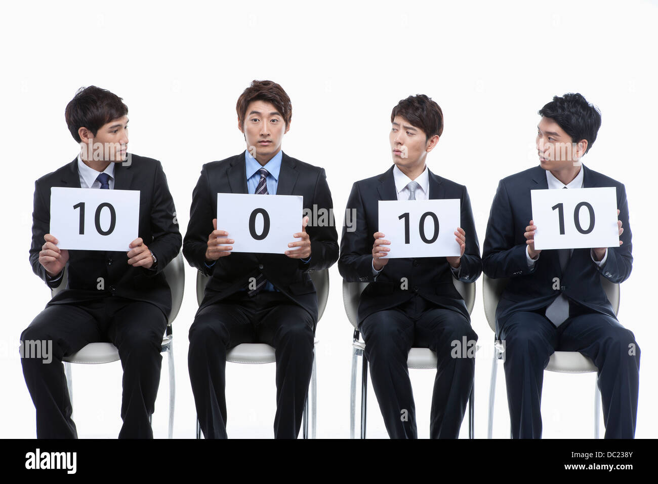 a businessman with zero score among others with 10 score Stock Photo ...