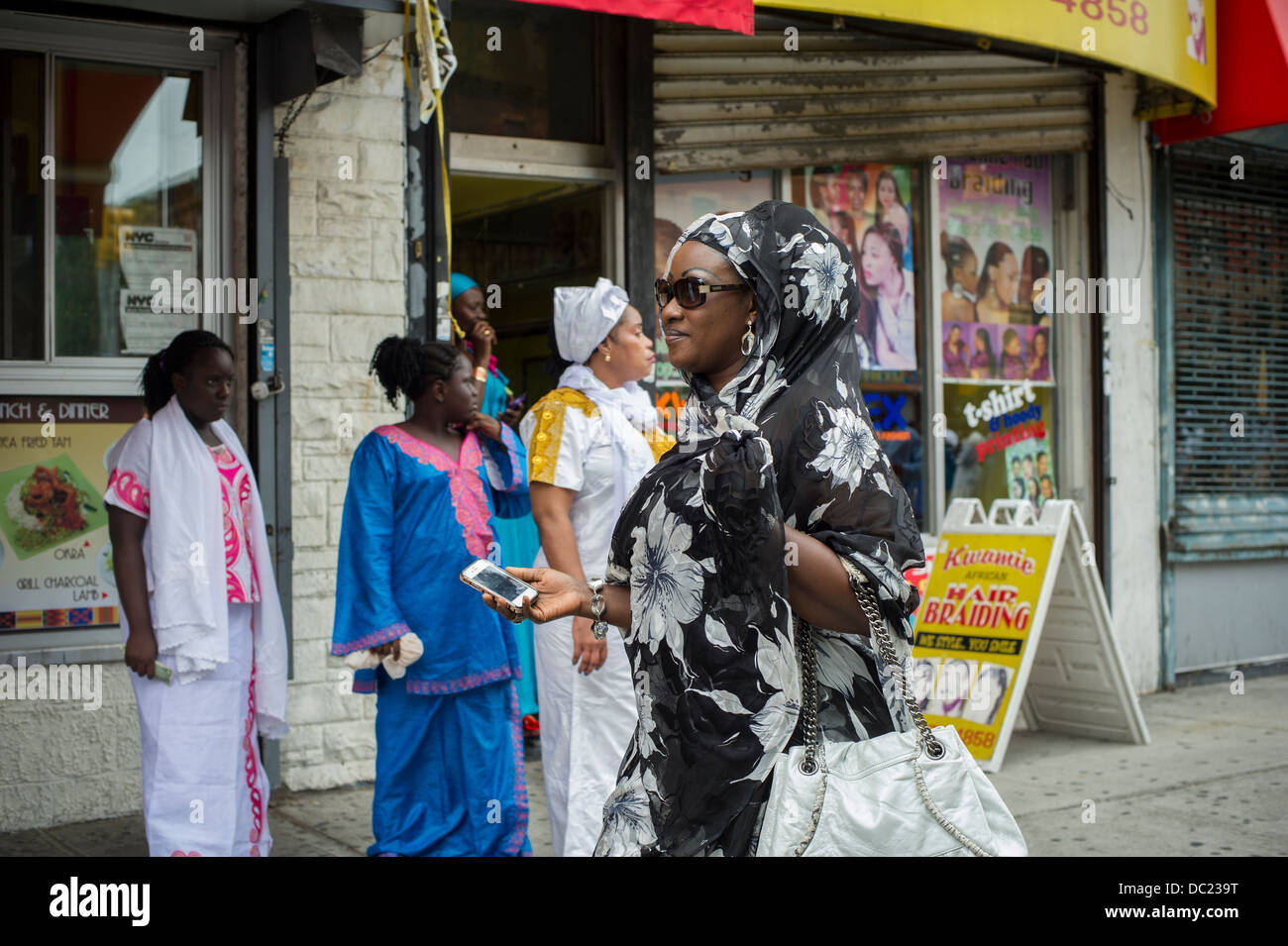 Senegalese immigrants participate in a parade in Harlem in New York ...