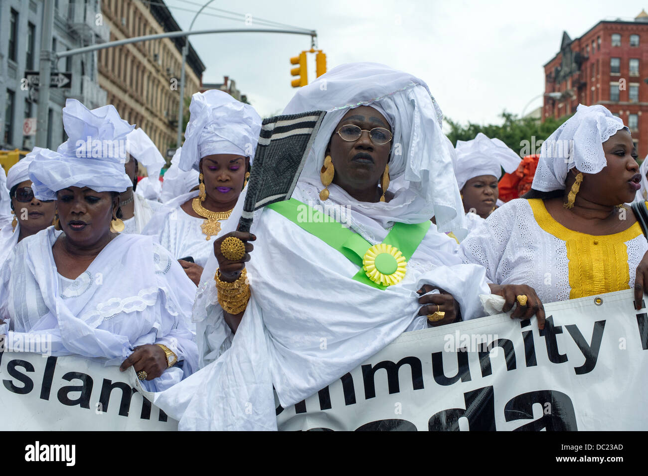 Senegalese immigrants participate in a parade in Harlem in New York ...